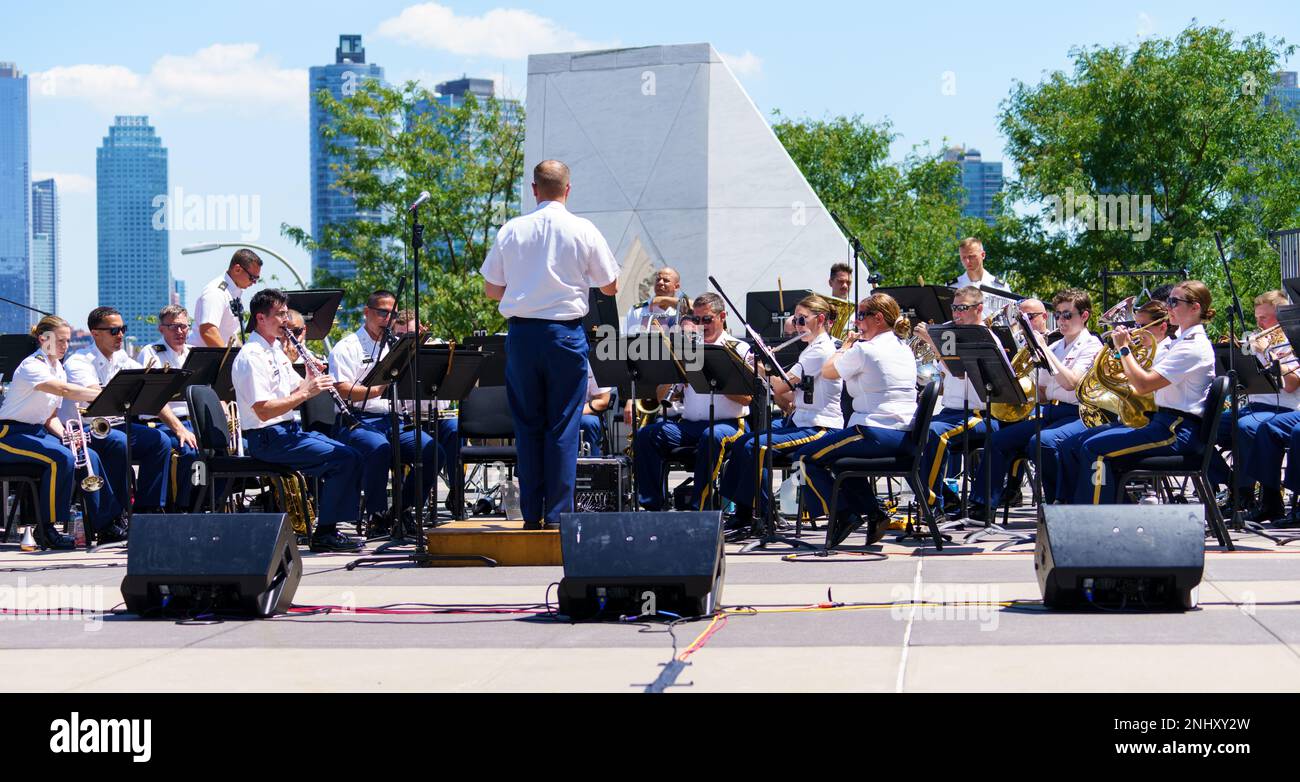 U.S. Army Soldiers assigned to the 42nd Infantry Division Band perform ...