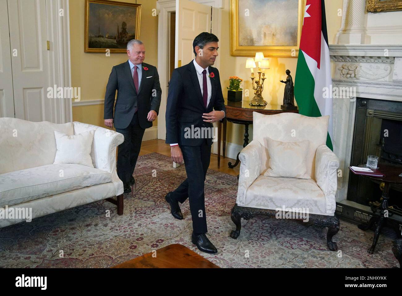 Britain's Prime Minister Rishi Sunak walks with King Abdullah II, King ...