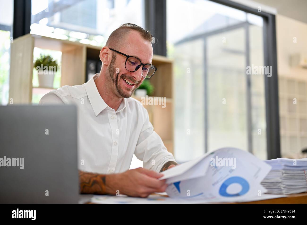 Happy and smart Caucasian businessman or male financial analyst wearing ...