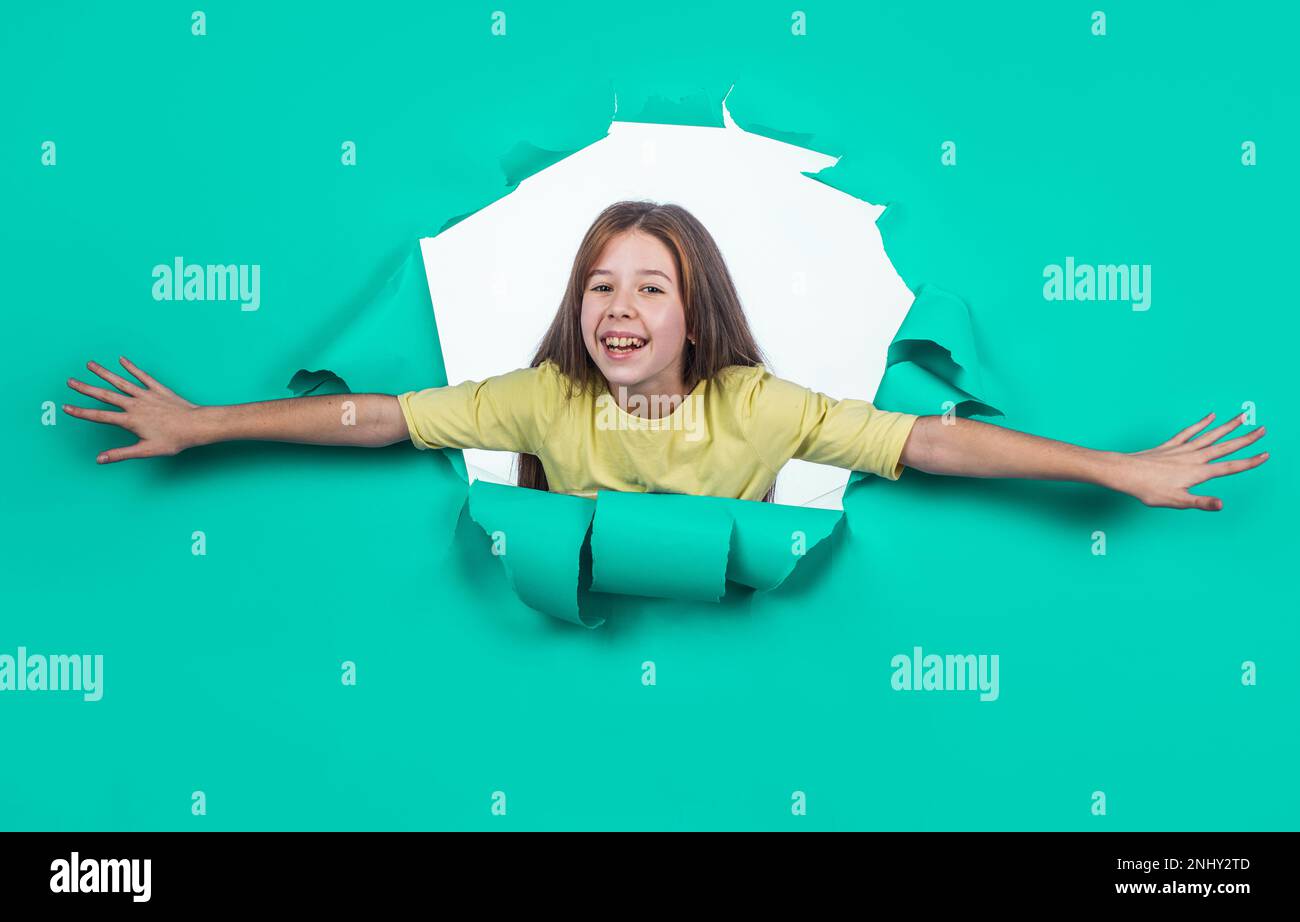 happy tween girl on blue background, happy childhood Stock Photo - Alamy