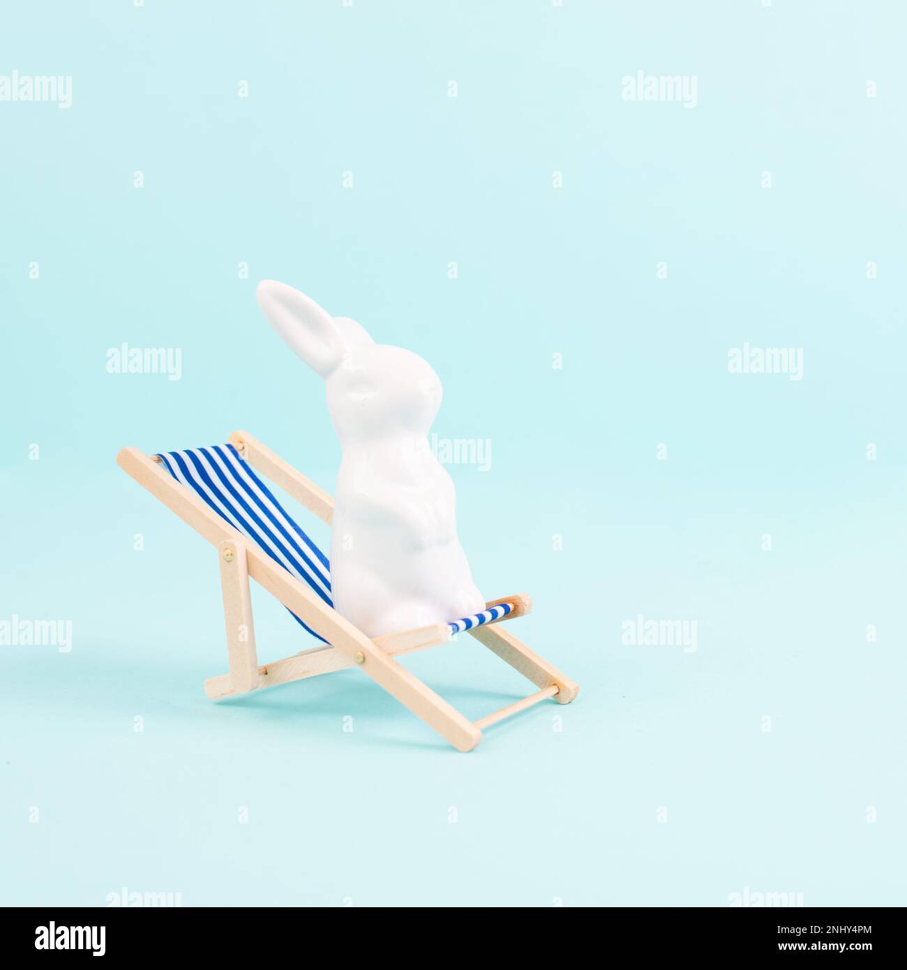 Bunny or rabbit sitting on lounge chair, easter holiday, vacation by ...