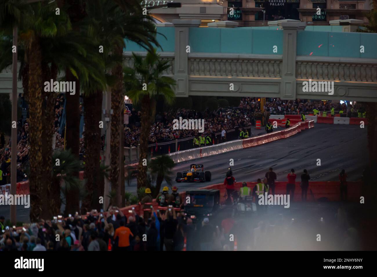 Red Bull driver Sergio Perez, of Mexico, drives his car down the Las Vegas Strip during the ...