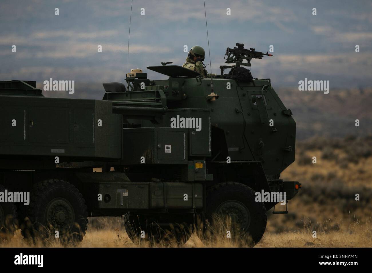A Family of Medium Tactical Vehicles (FMTV) truck, mounted with a High ...