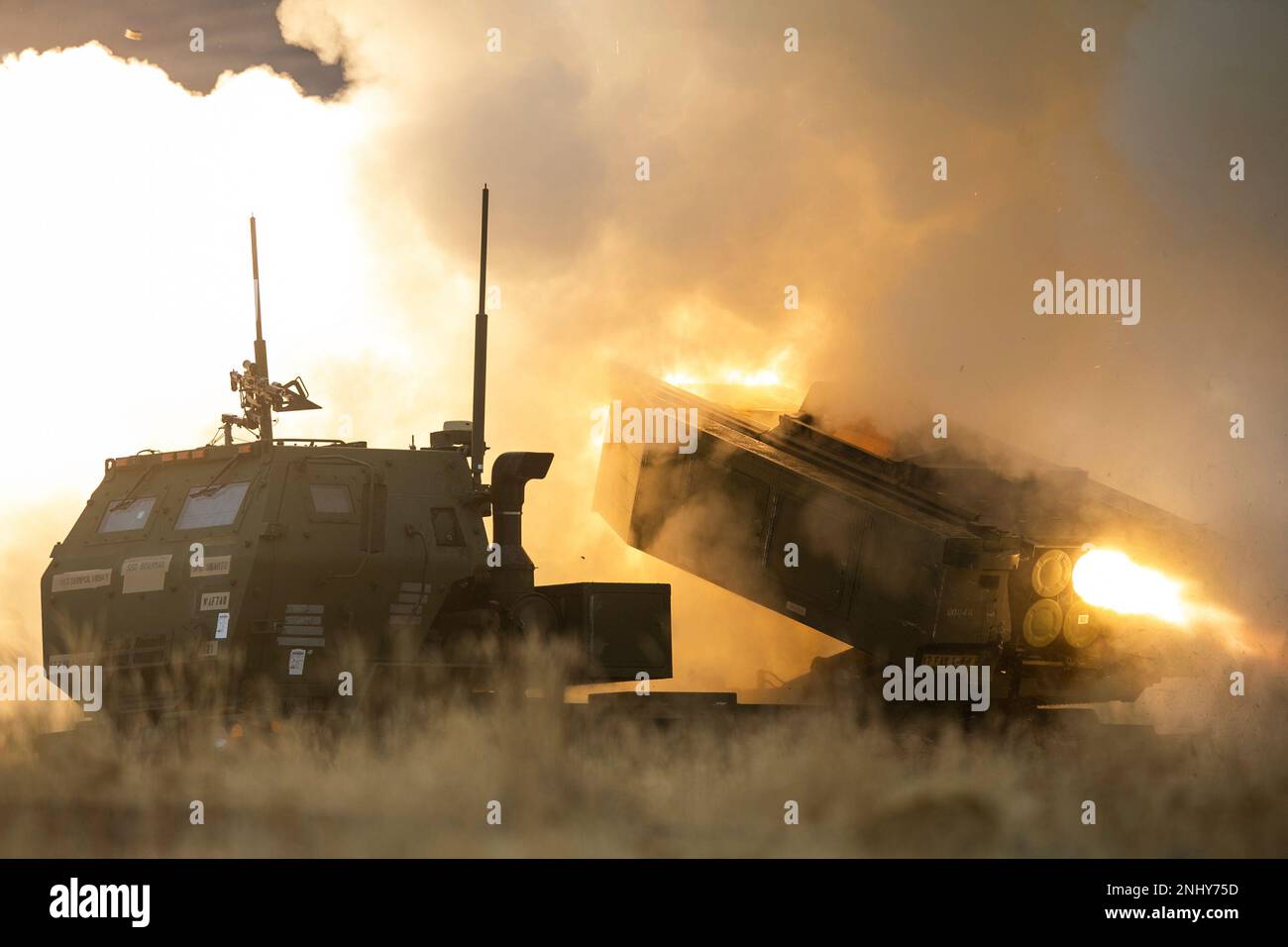 A High Mobility Artillery Rocket System (HIMARS) fires a rocket during ...
