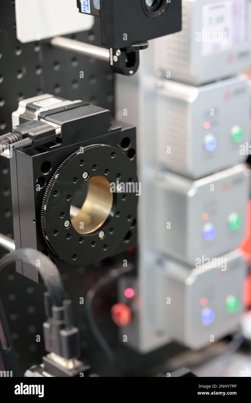 Optomechanics and motorized precision rotary stage. Selective focus ...