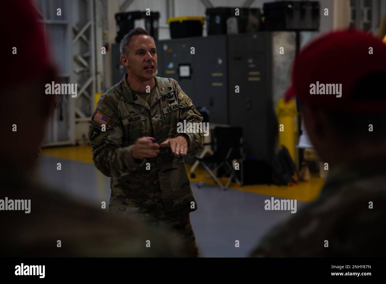 U.S. Army Maj. Jett Nelson, with the 56th Troop Command, gives a Ch-47 ...