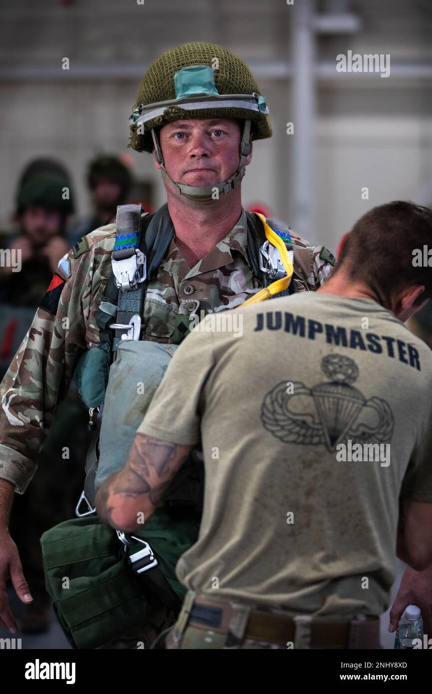 U.S. Army Jumpmaster, performs Jumpmaster Personal Inspection (JMPI) on ...