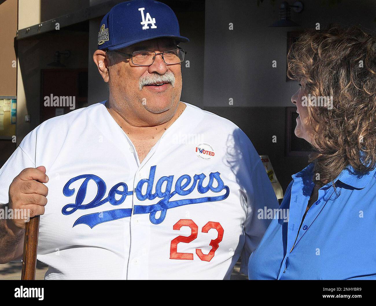 Ruben Tagaban, left, wearing his "I Voted" sticker, and his wife ...