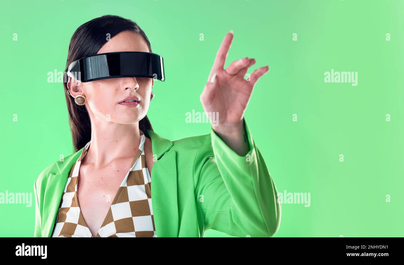 Woman, virtual reality and glasses in studio with hand by green ...