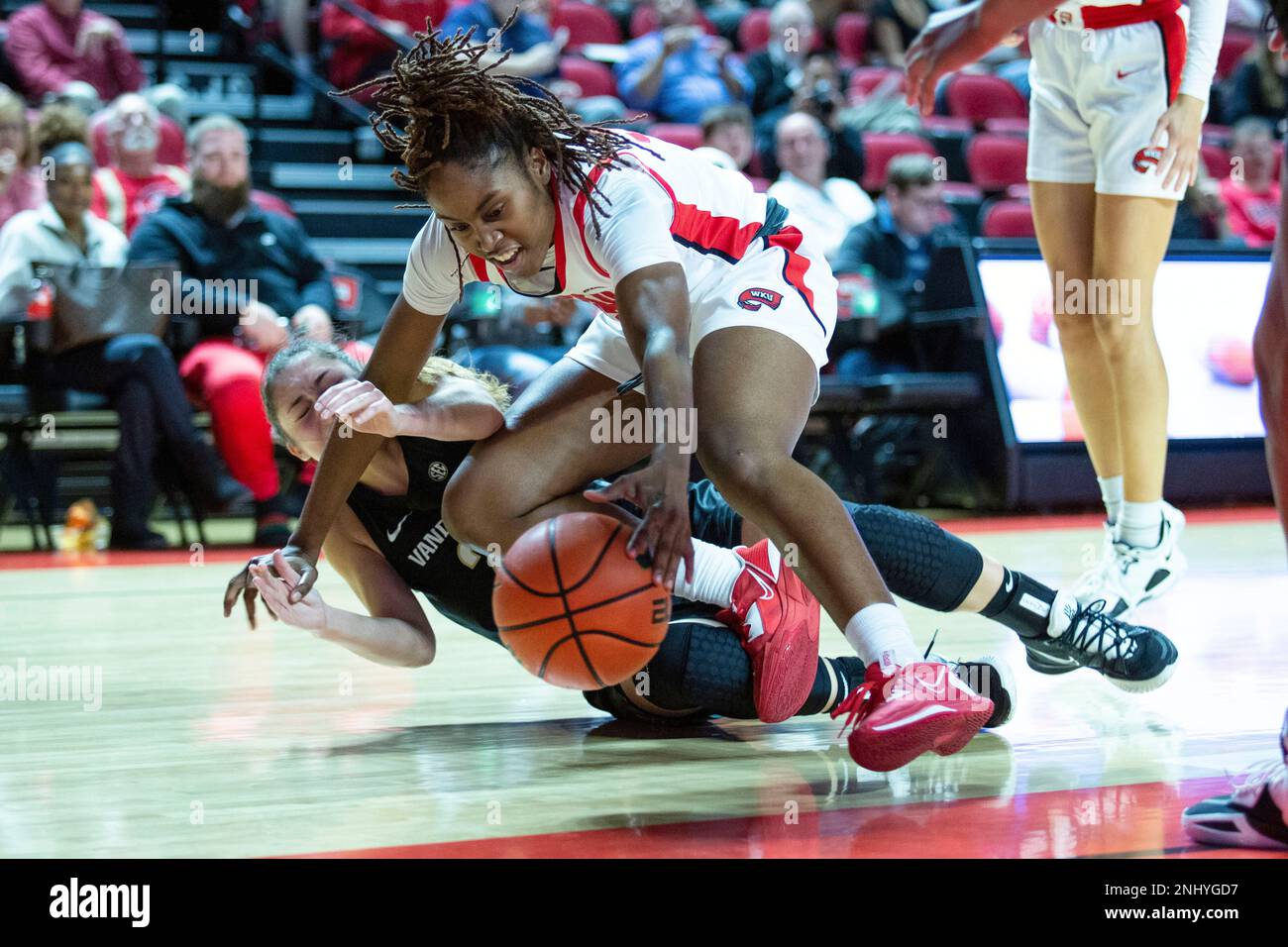 Western Kentucky guard Karris Allen, top, battles for the ball with ...
