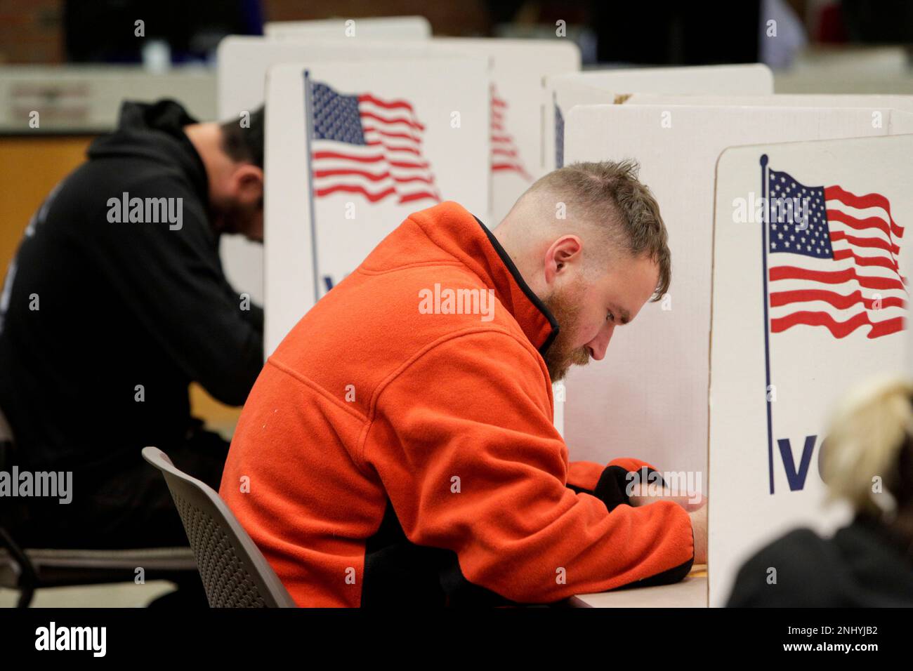 Thomas Voss of Davenport casts his ballot at the Scott County ...