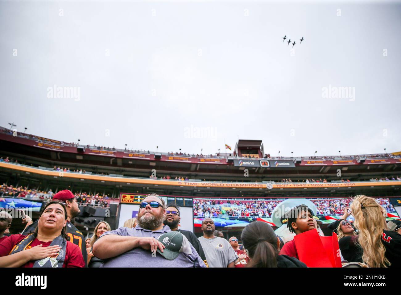 A group of T-38 Talon fighter jets fly a missing man formation before a ...