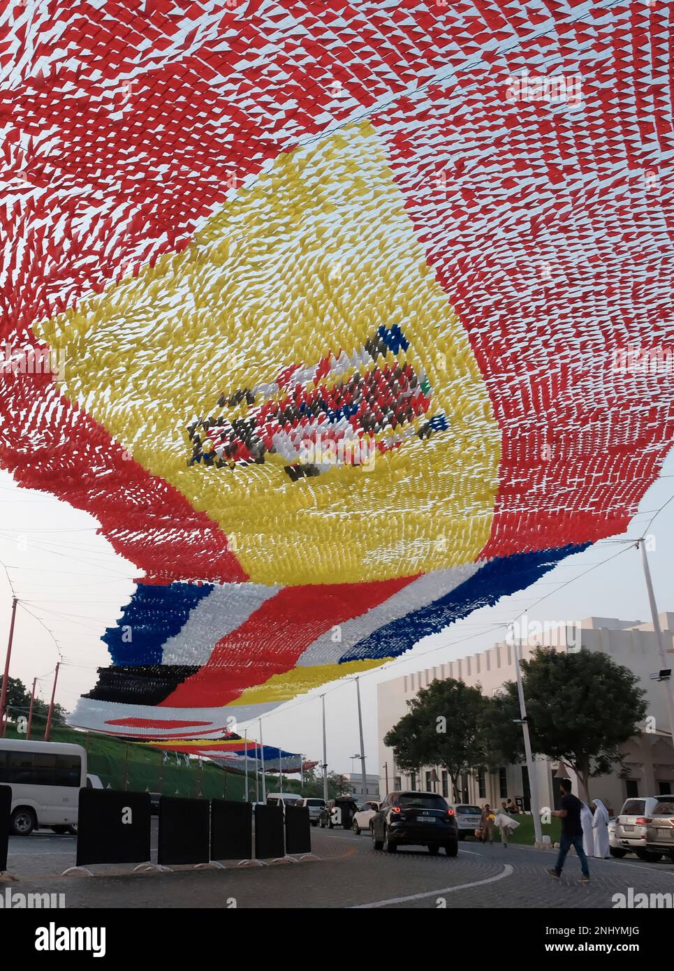 Lusail street is decorated with the national flags of the countries ...