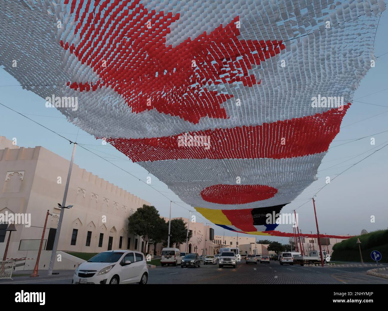 Lusail street is decorated with the national flags of the countries ...