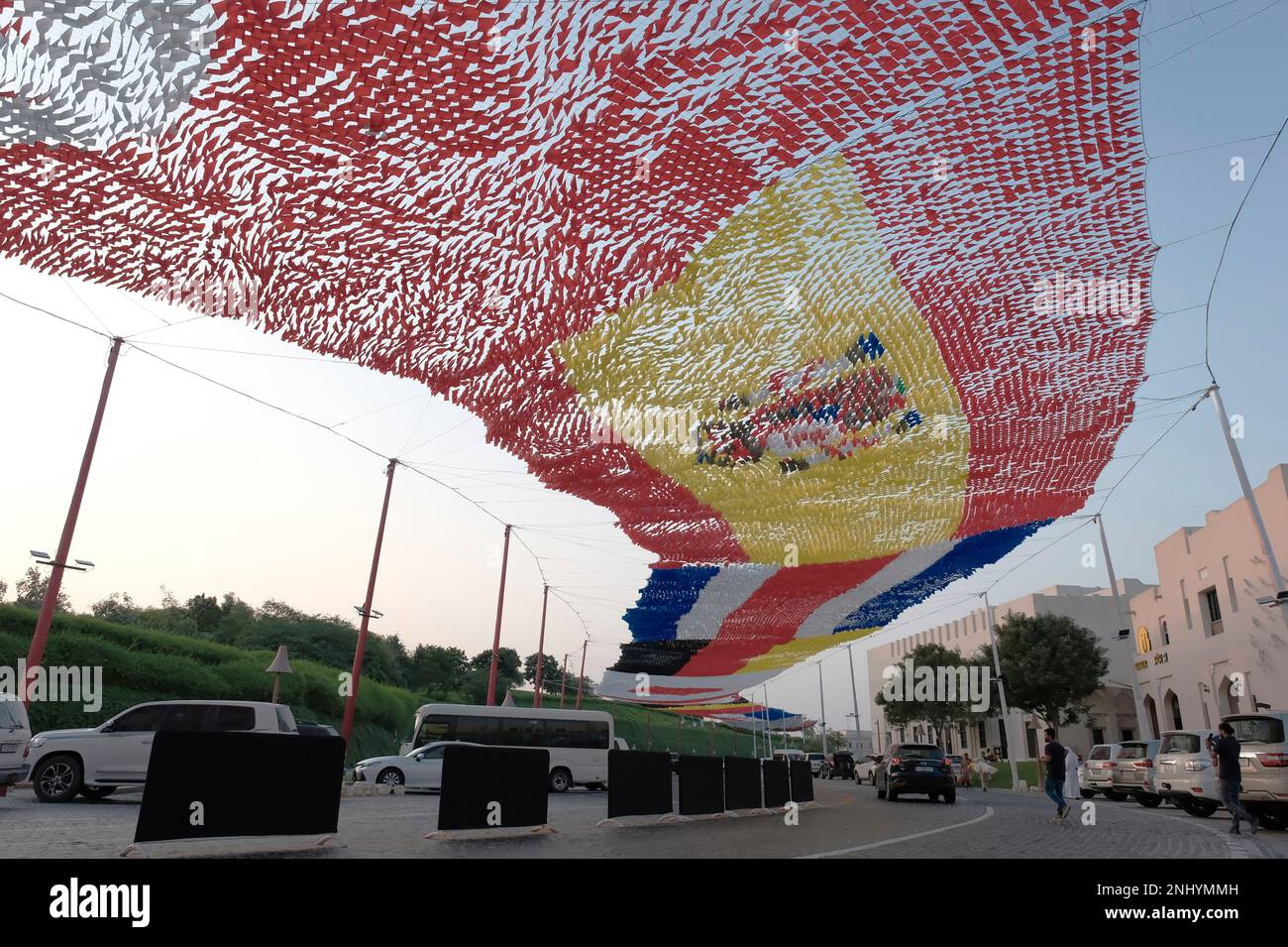 Lusail street is decorated with the national flags of the countries ...