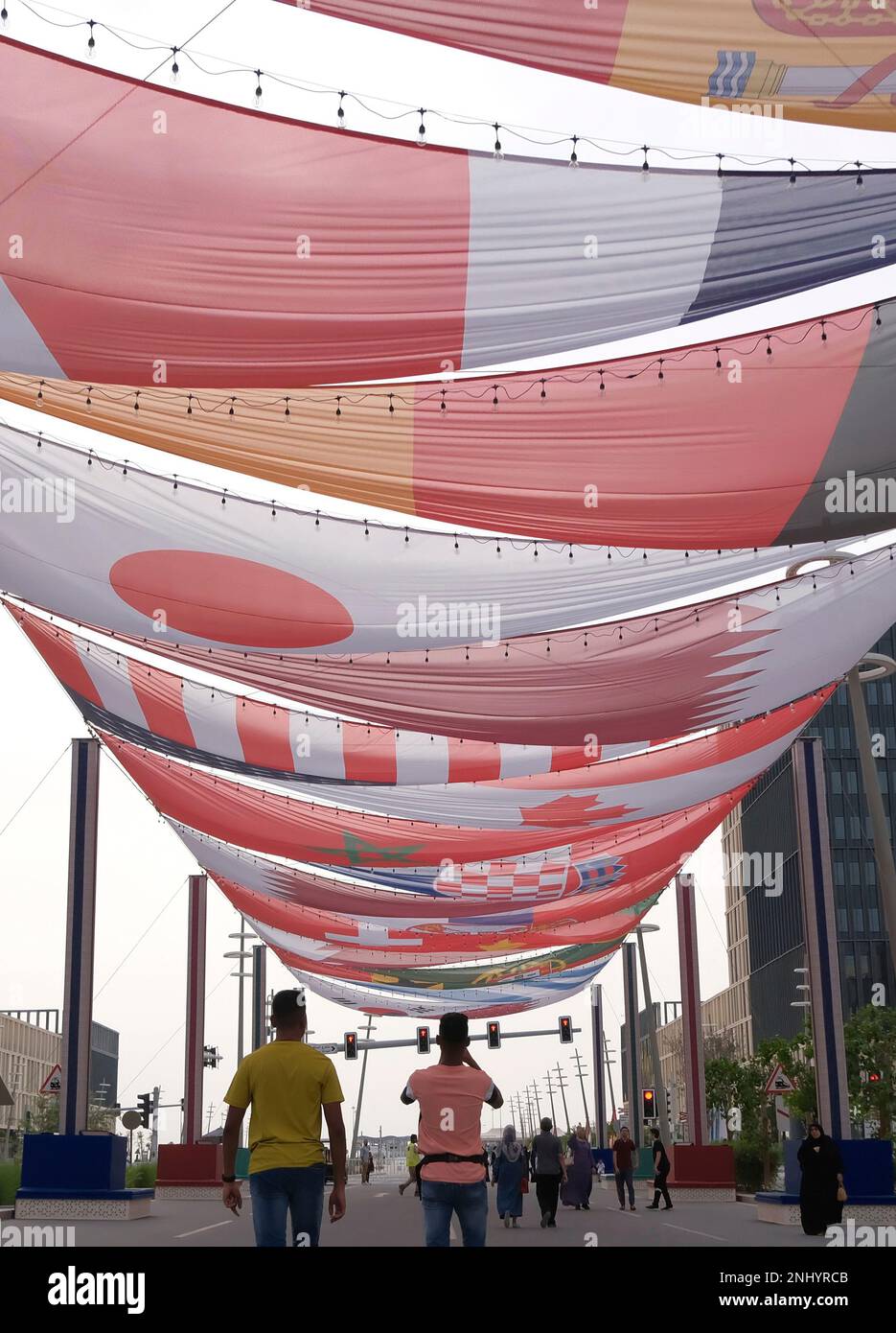 Lusail street is decorated with the national flags of the countries ...