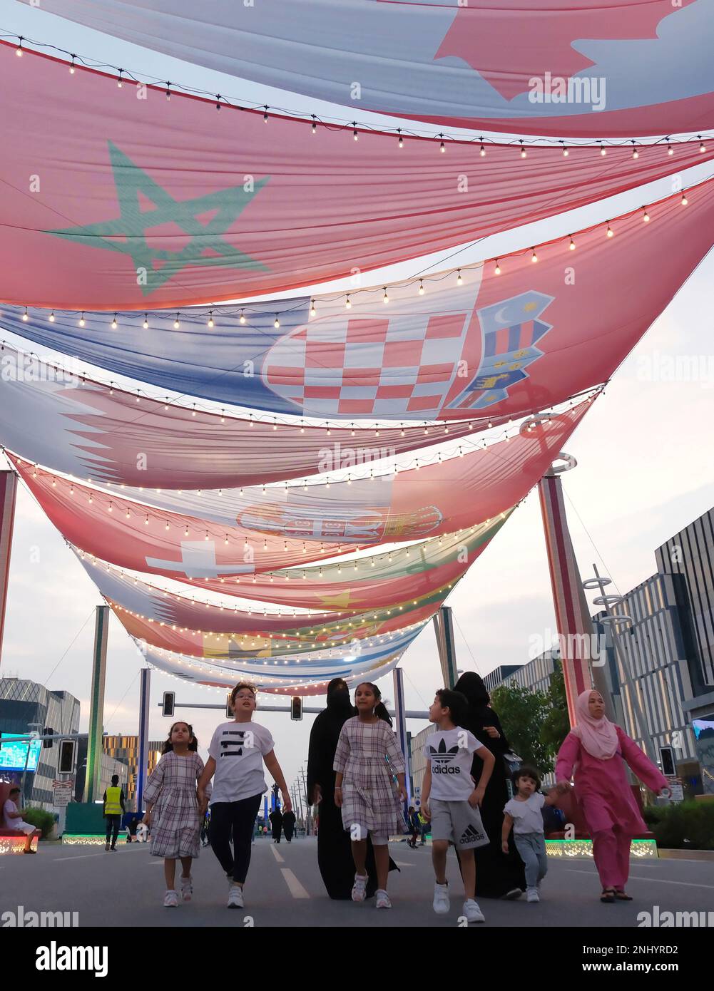 Lusail street is decorated with the national flags of the countries ...