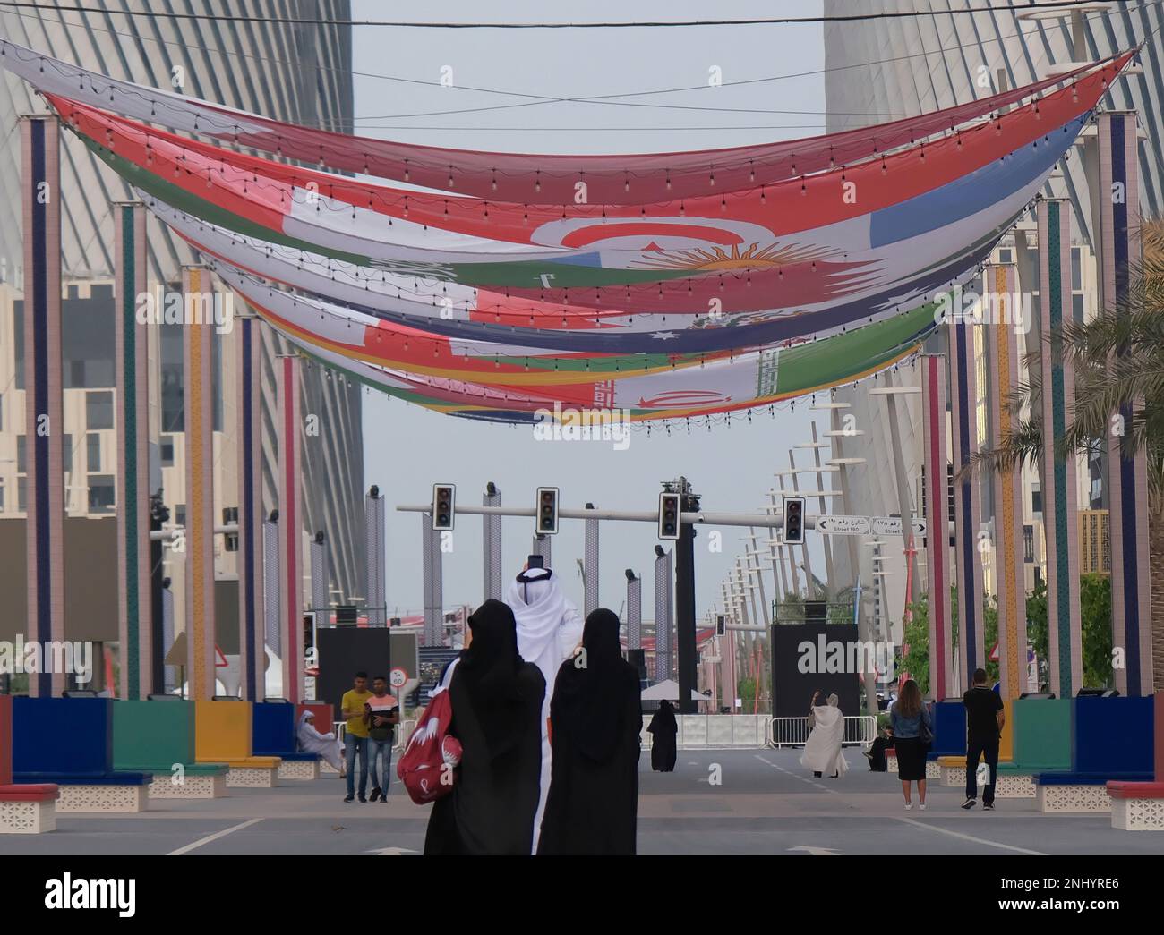 Lusail street is decorated with the national flags of the countries ...