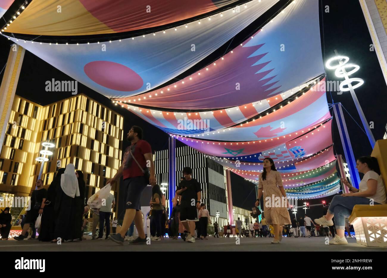 Lusail street is decorated with the national flags of the countries ...
