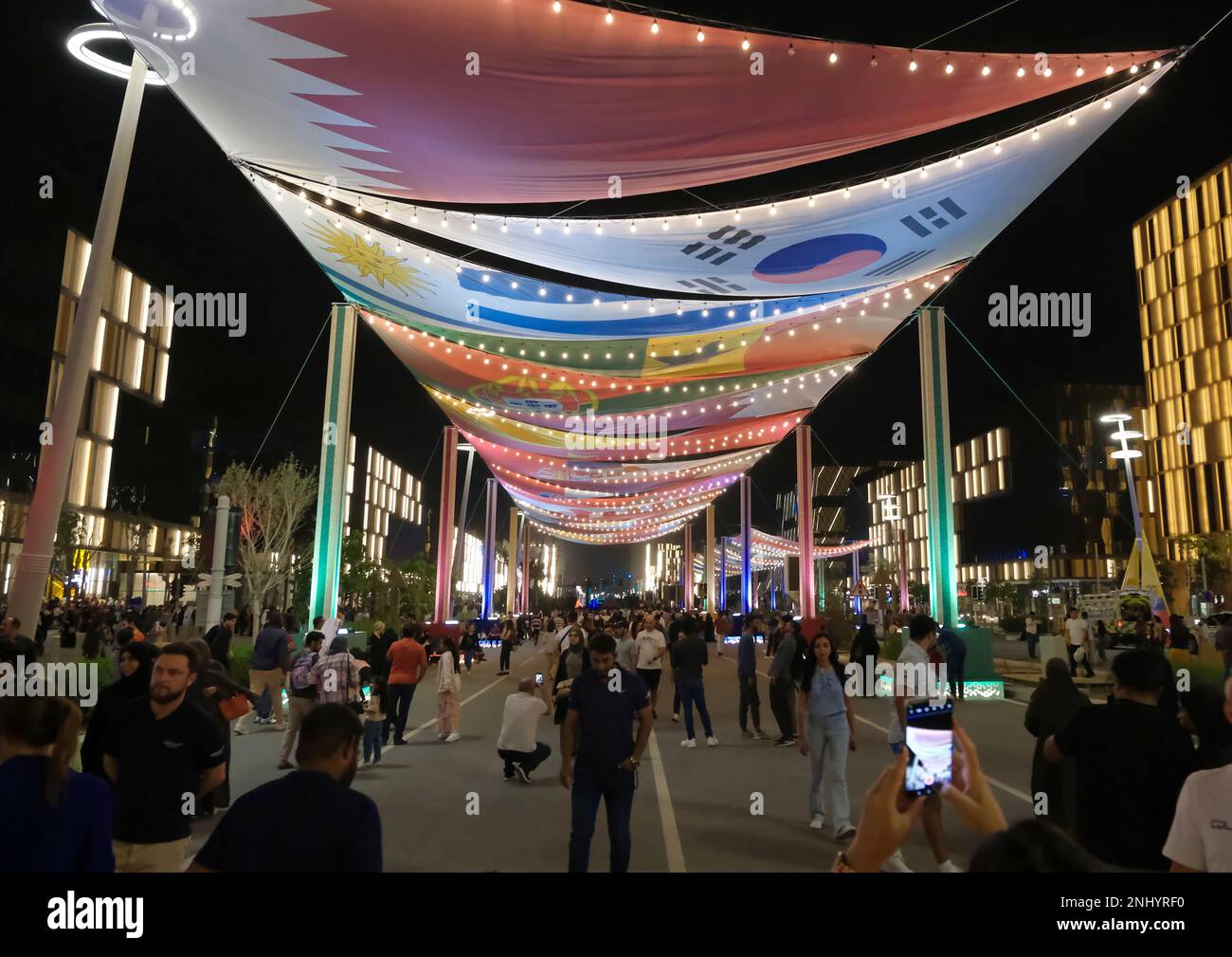 Lusail street is decorated with the national flags of the countries ...