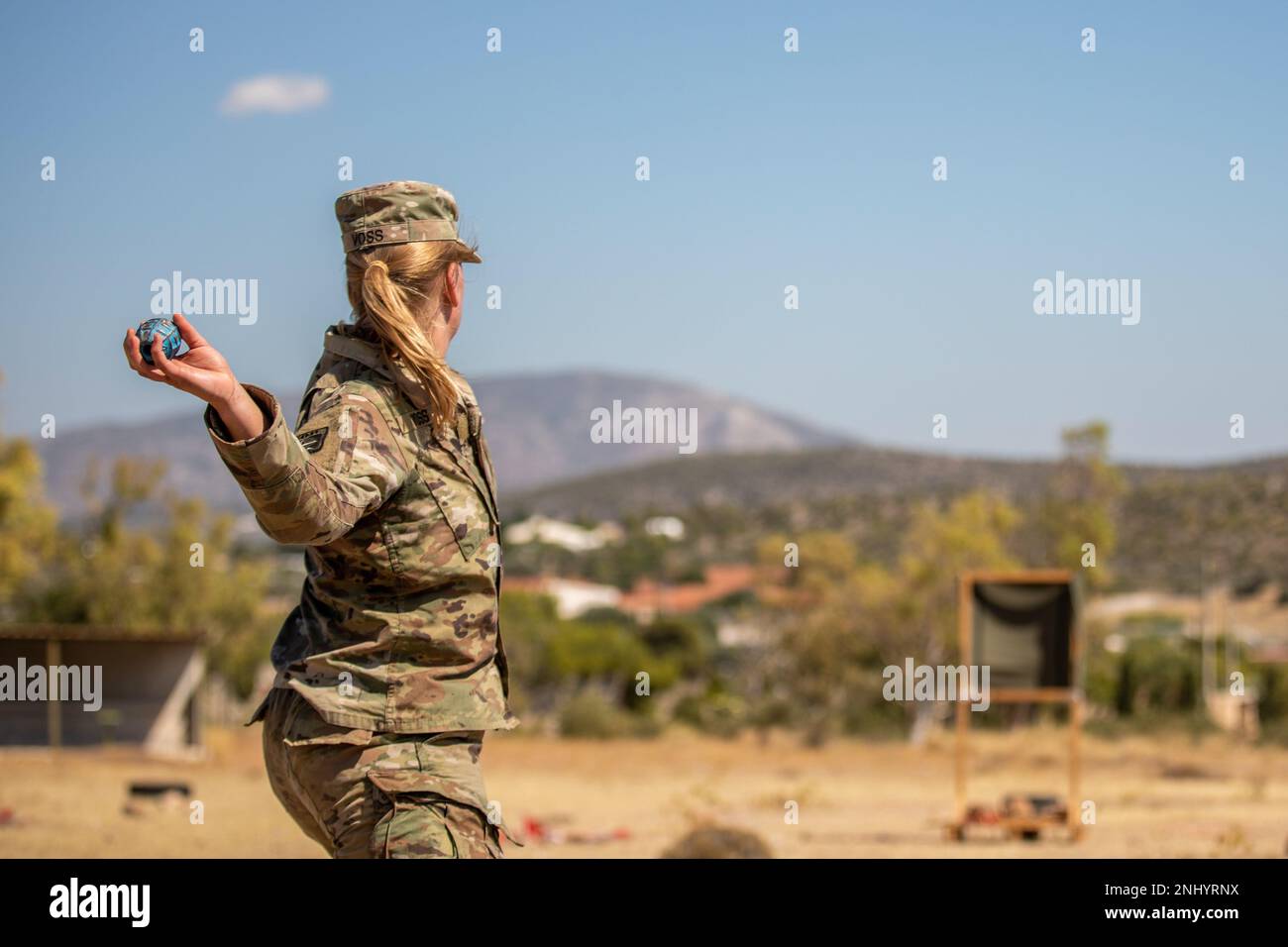 Army Reserve 2nd Lt. Katy Voss, U.S. Army Reserve Legal Command, throws ...