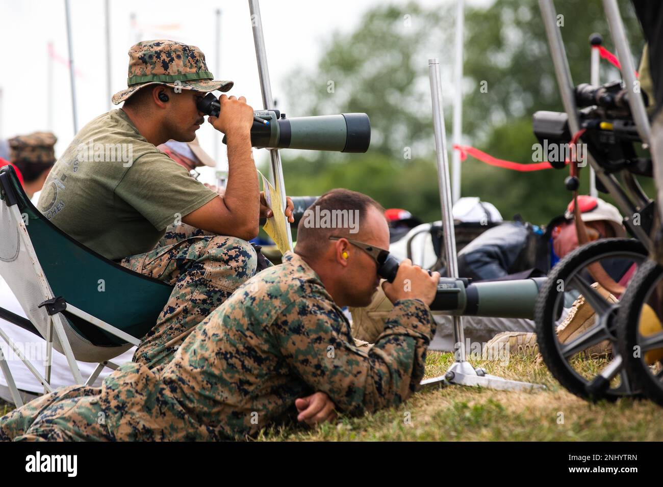 U.S. Marines with the Marine Corps Shooting Team check shotpoints ...