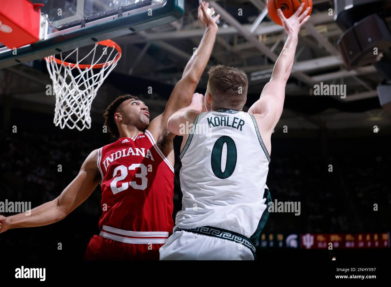 Michigan State's Jaxon Kohler, right, shoots against Indiana's Trayce ...