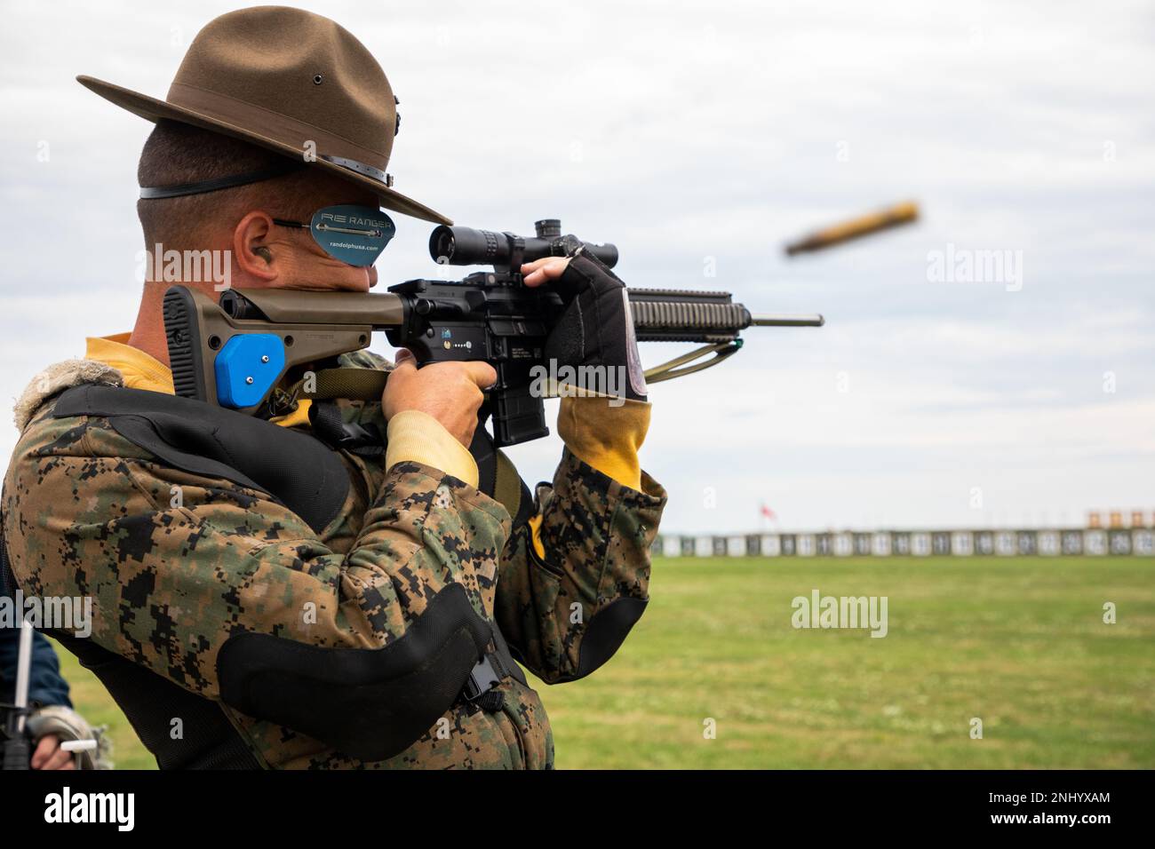 A Marine with the Marine Corps Shooting Team fires his rifle during the ...