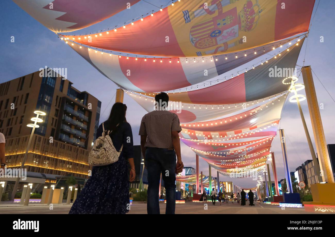 Lusail street is are decorated with the national flags of the countries ...