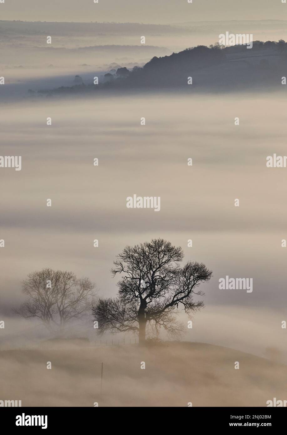 The mists of Avalon rolling through the landscape from Glastonbury Tor ...