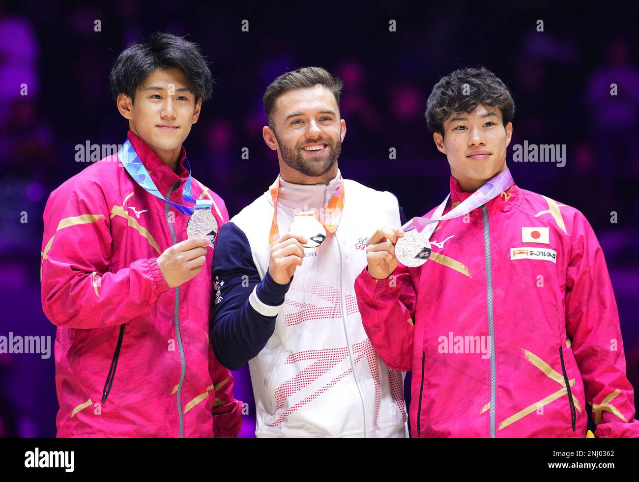 (L-R) Daiki Hashimoto of Japan, Giarnni Regini-Moran of Great Britain and Ryosuke Doi of Japan ...
