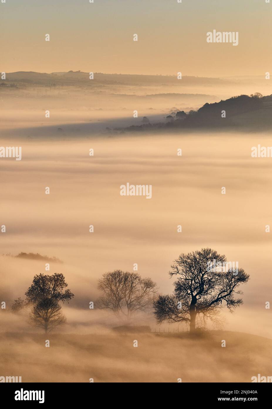 The mists of Avalon rolling through the landscape from Glastonbury Tor ...