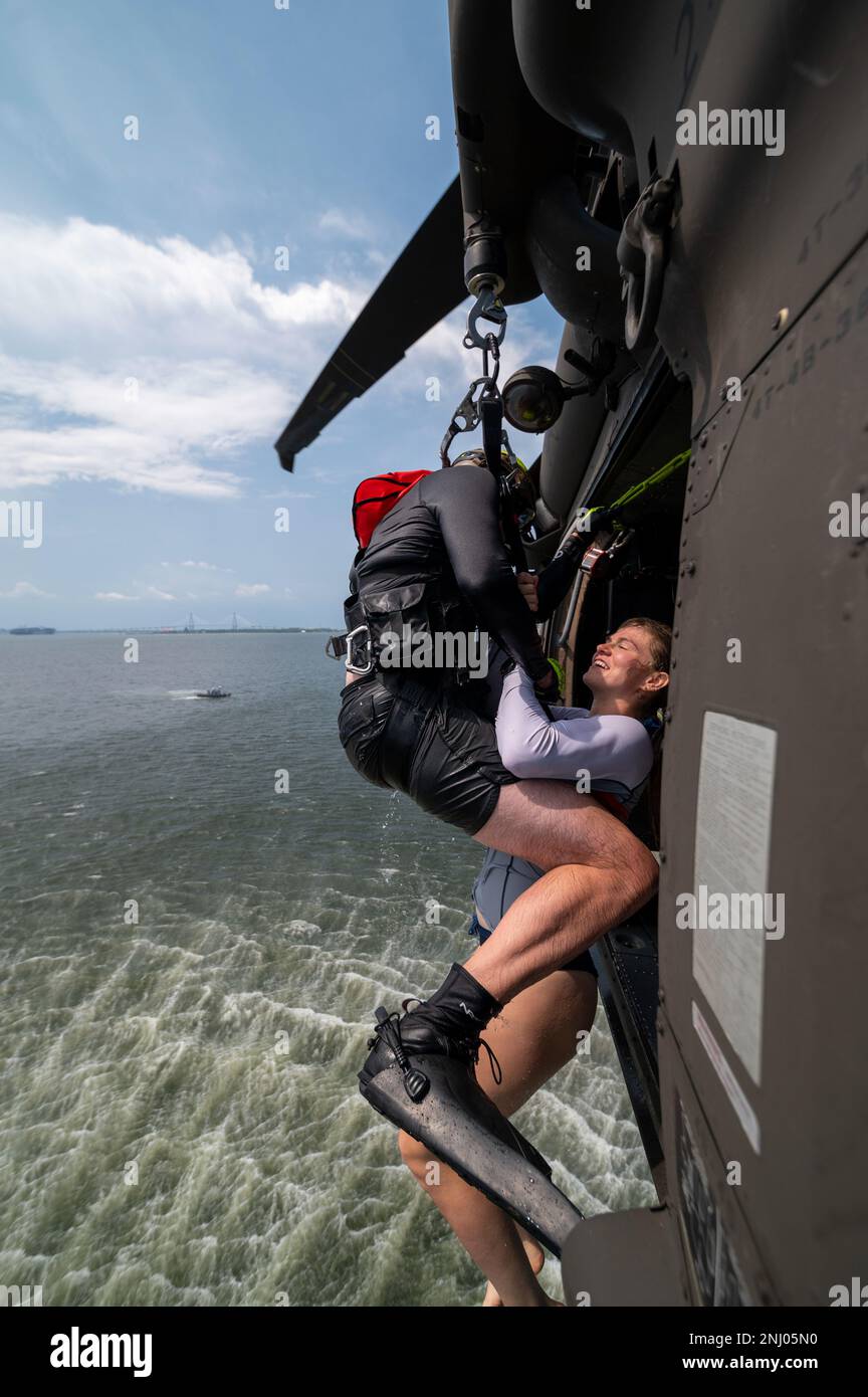 An FBI Hostage Rescue Team member guides Kelsie-Blake Weeks, a Barrier ...