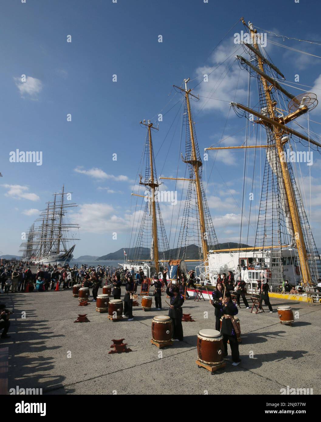 Sailing vessels gather at Tokuyama Kudamatsu Port during an event to celebrate the 100th ...