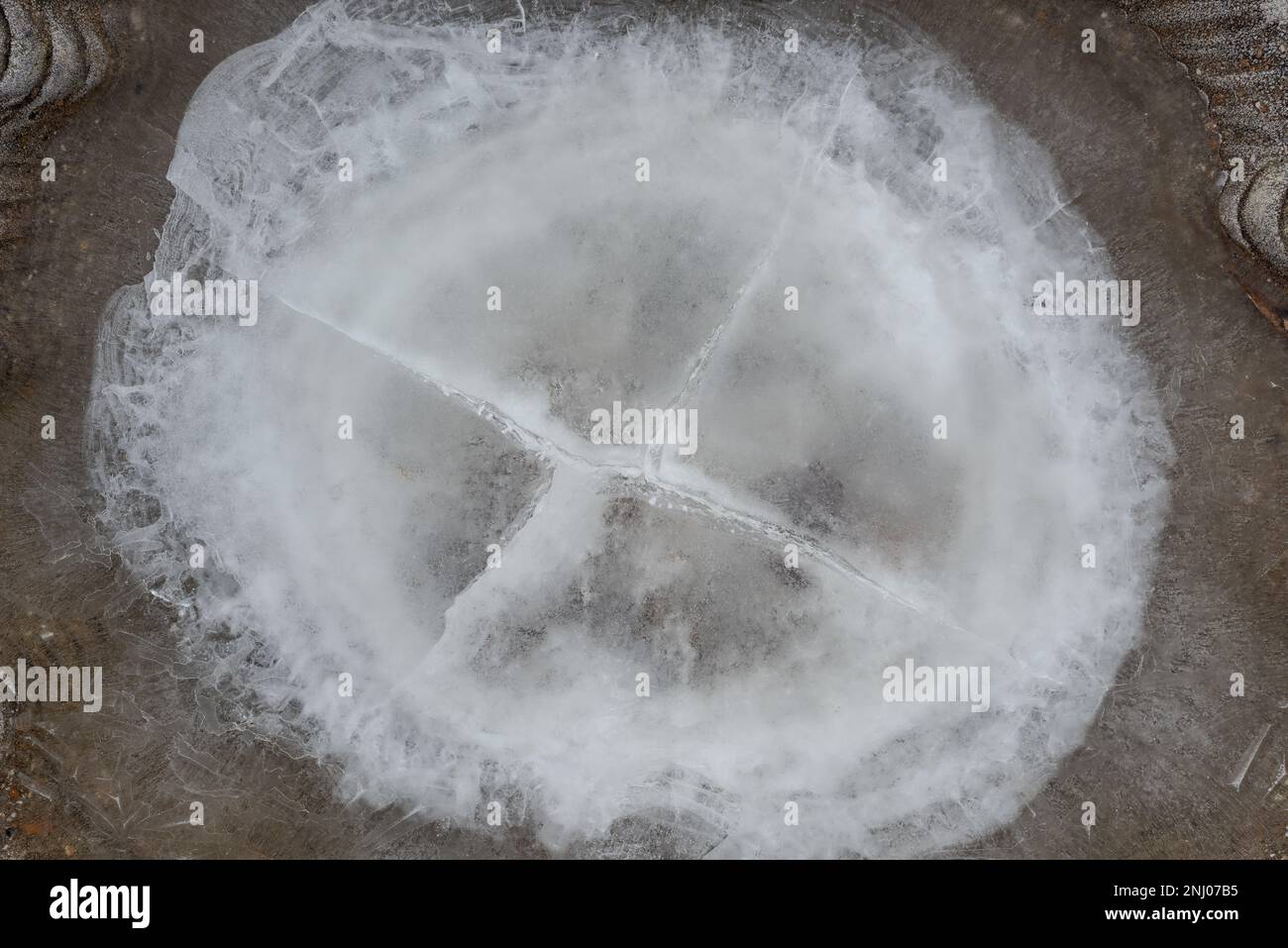 Expansion of ice buckling under the stress and cracking as a pool of ...