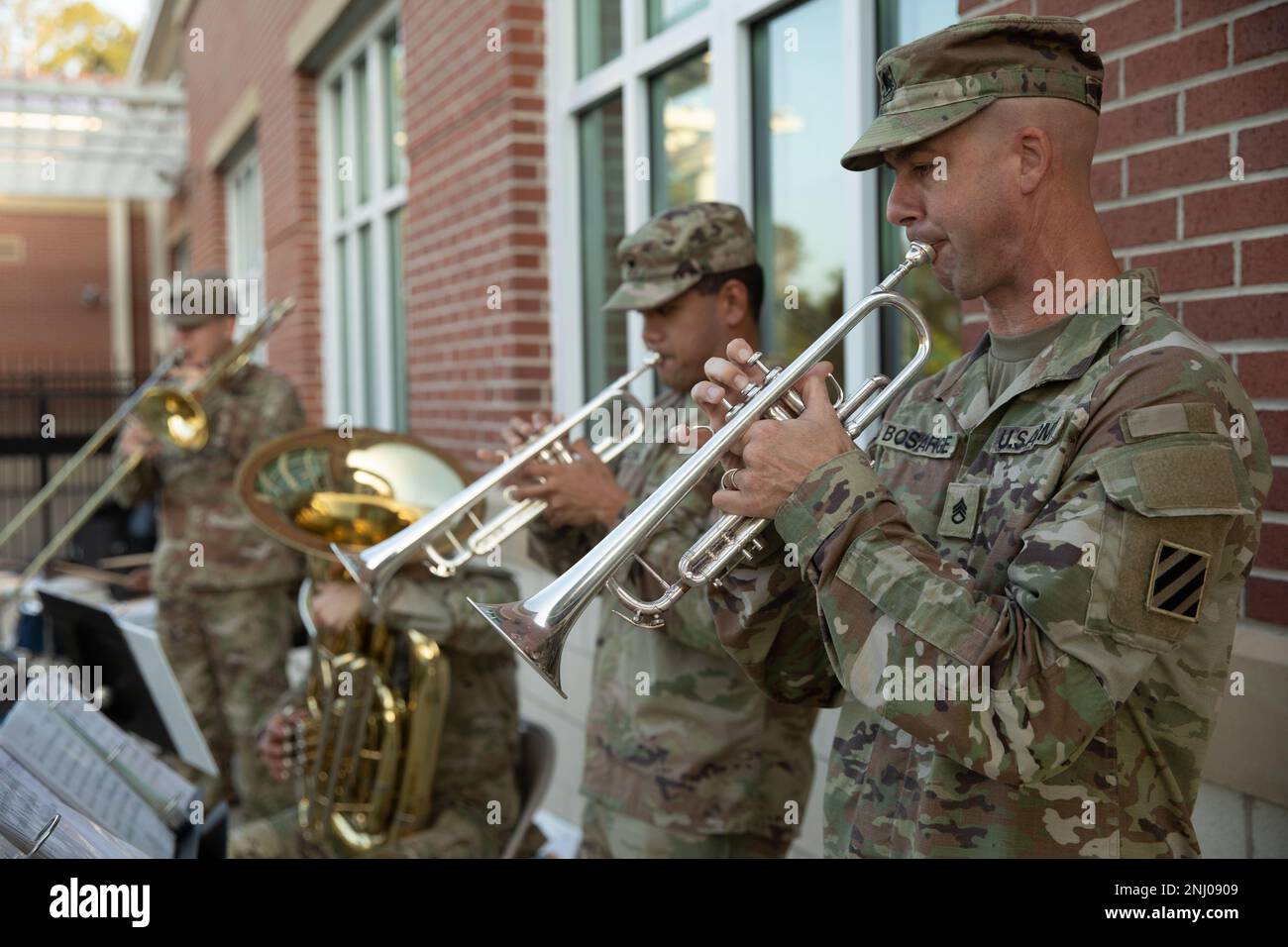 U.S. Army Soldiers assigned to 3rd Infantry Division Band play during a ...