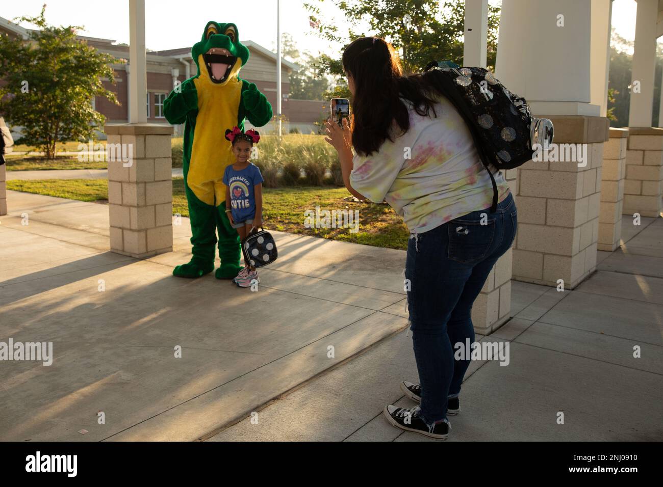 Ollie, the Diamond Elementary School mascot, greets students at Diamond ...