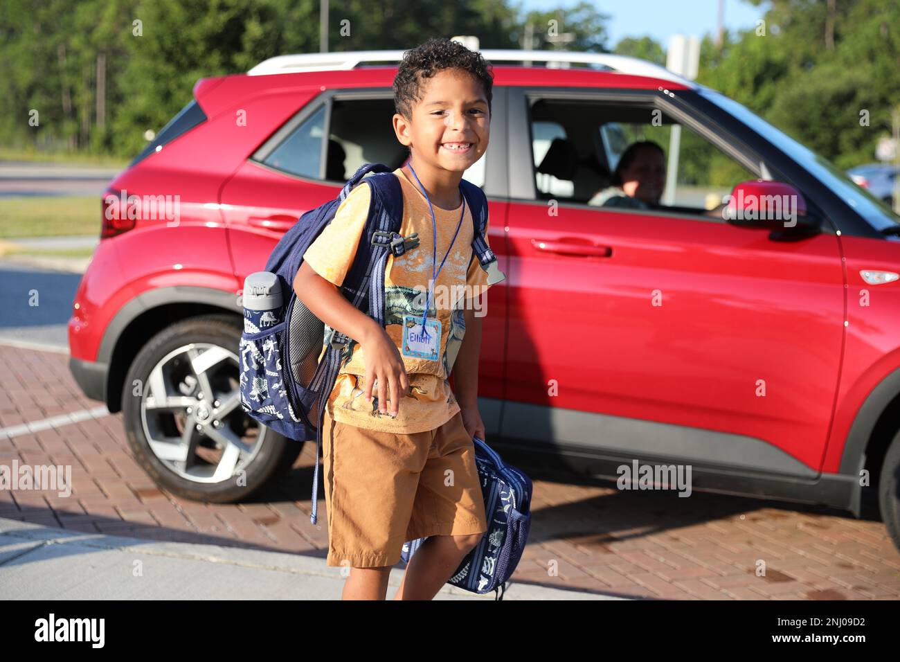 A student with Murray Elementary School poses for a photo during a back ...