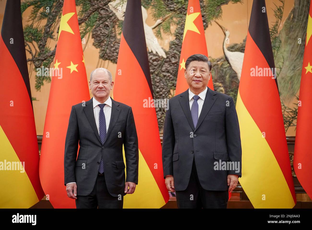 German Chancellor Olaf Scholz, left, poses for a photo with Chinese ...