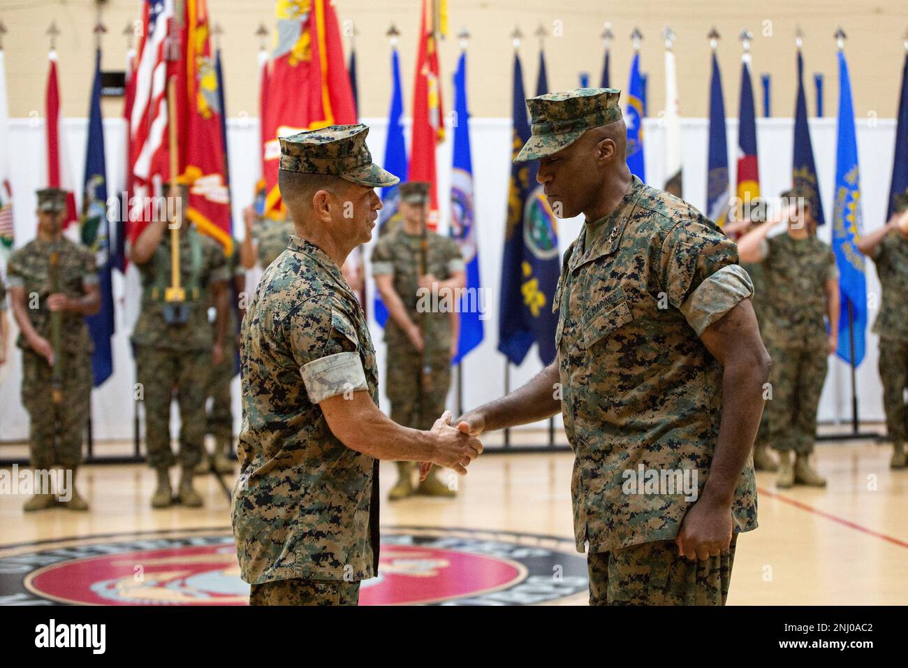 U.S. Marine Corps Lt. Gen. Michael E. Langley, right, the outgoing ...