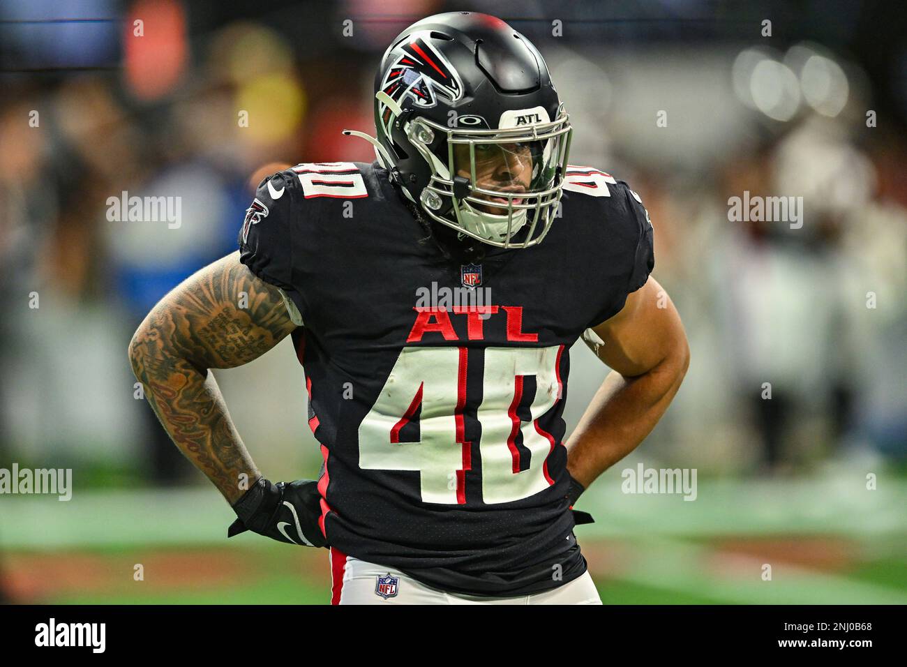 ATLANTA, GA – OCTOBER 30: Atlanta fullback Keith Smith (40) warms up ...