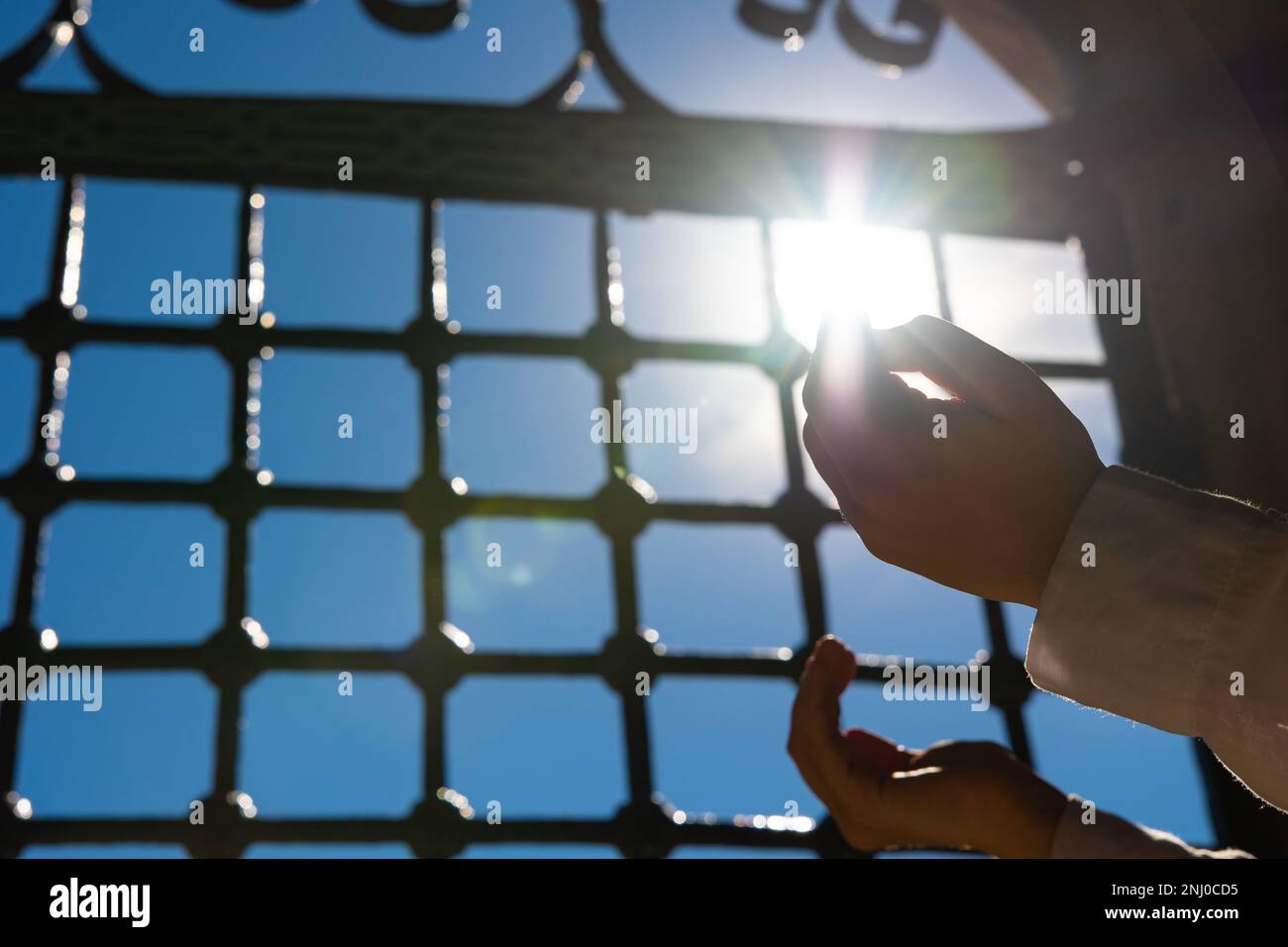 Islamic background photo. Muslim woman praying with raising hands and ...