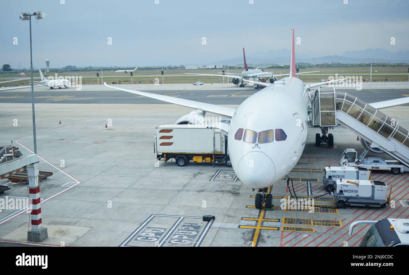 Airplane, airport or loading luggage for traveling outdoors on runway ...