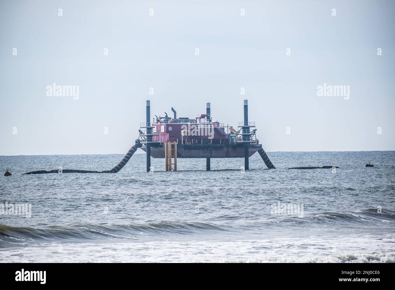 Dredging machine pumping sand into Robert Moses and Fire Island Beaches ...