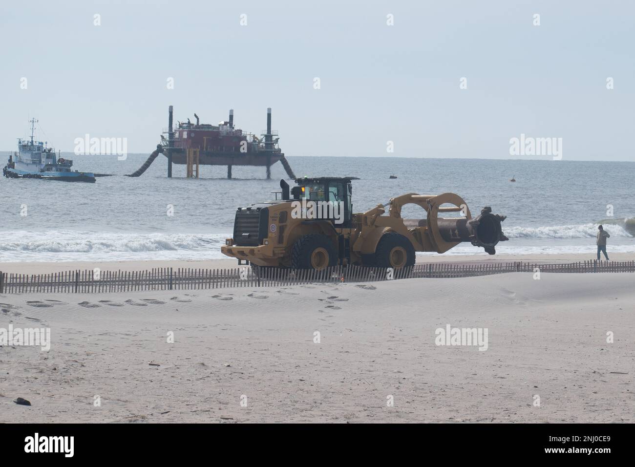 Heavy equipment getting beach ready for summer Stock Photo - Alamy