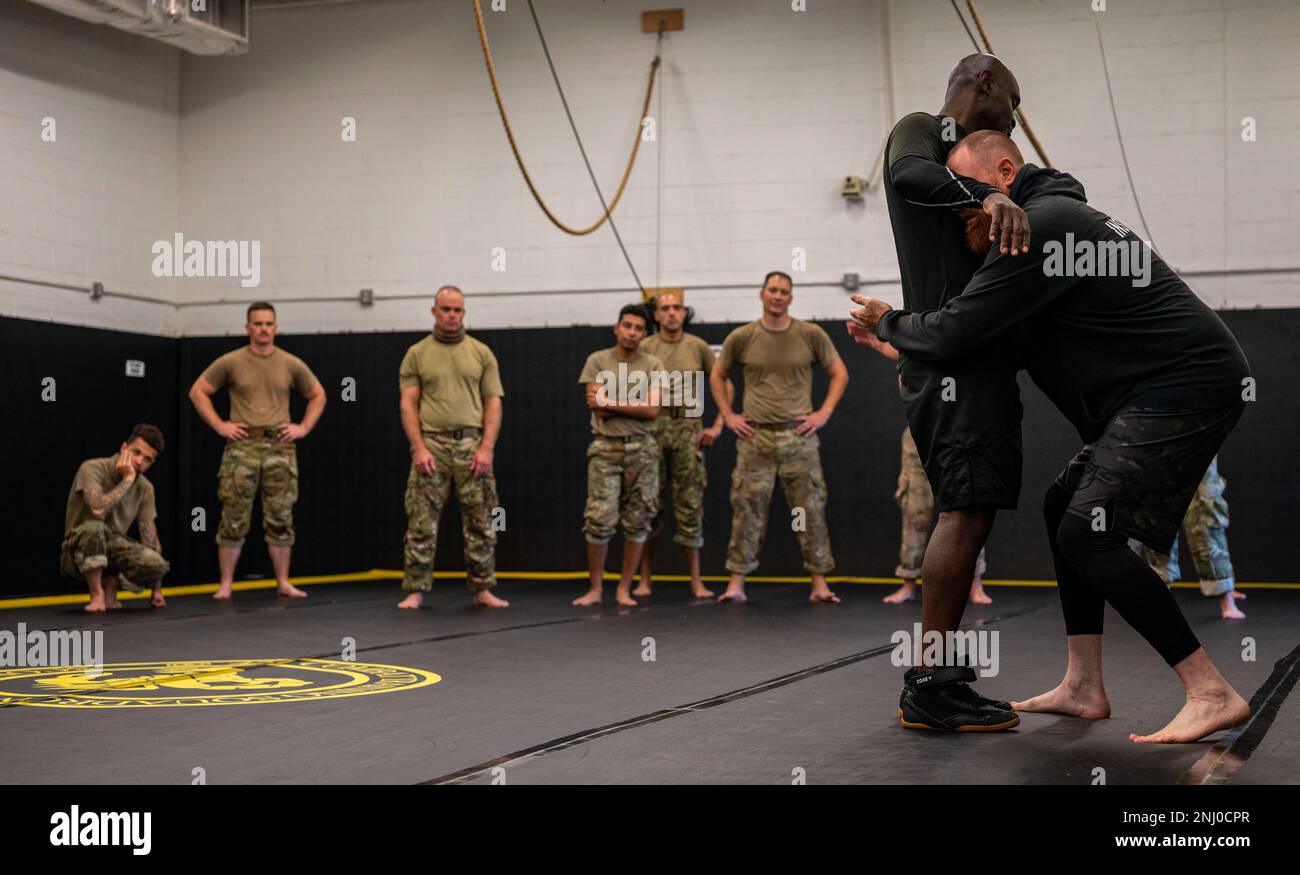 Two 421st Combat Training Squadron instructors demonstrate combative techniques during ...