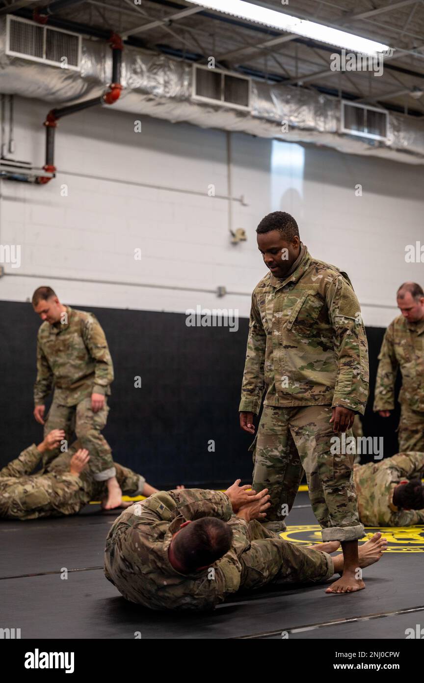 U.S. Air Force Airmen run through combative drills during the self ...
