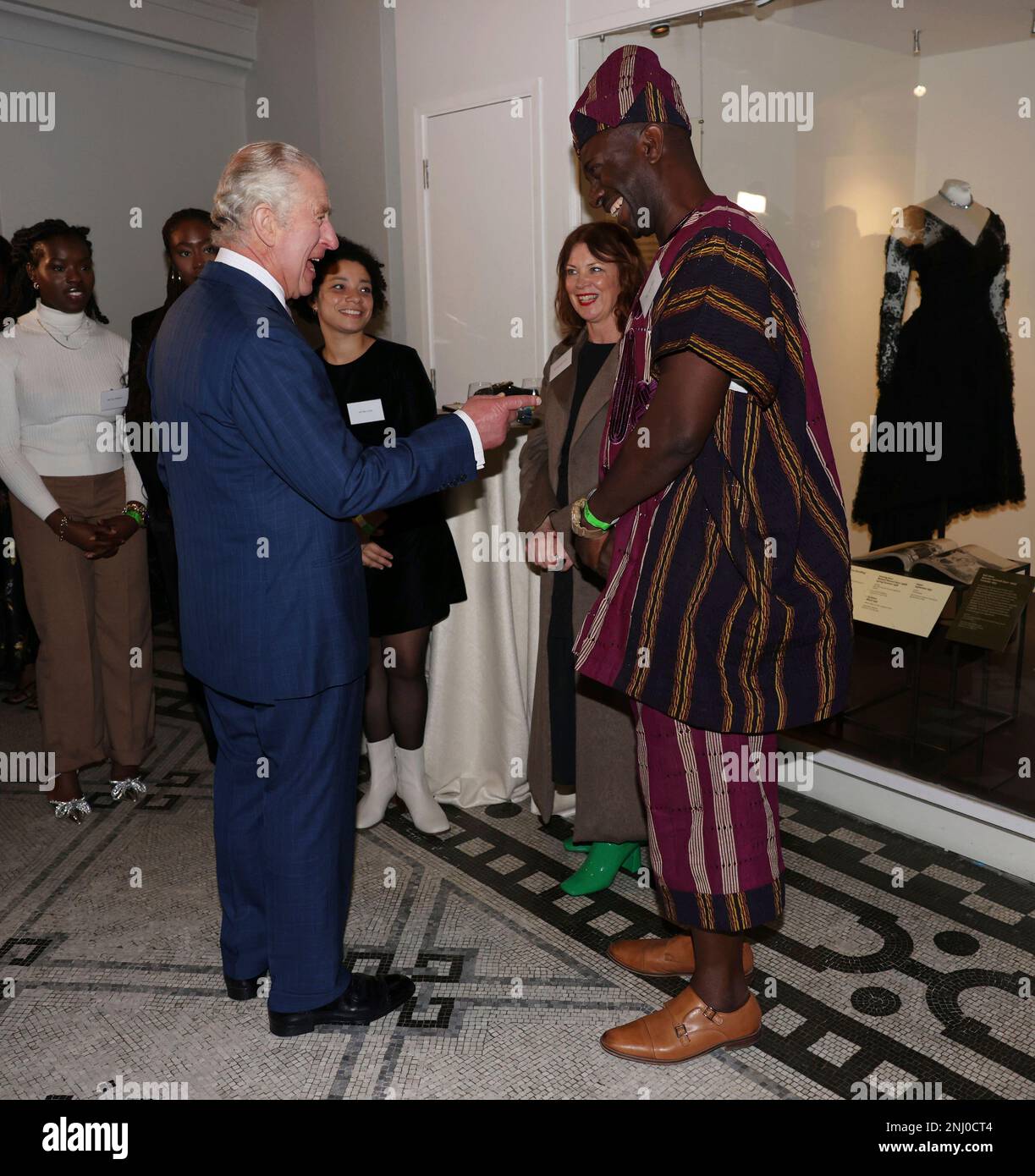 Britain's King Charles III, reacts during his visit to the Africa ...
