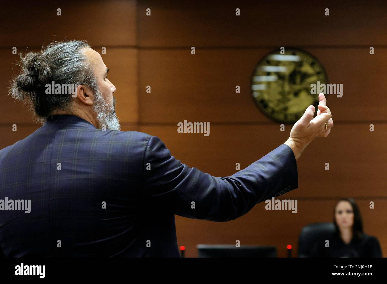 EDS NOTE: OBSCENITY - Manuel Oliver gives the middle finger to the ...