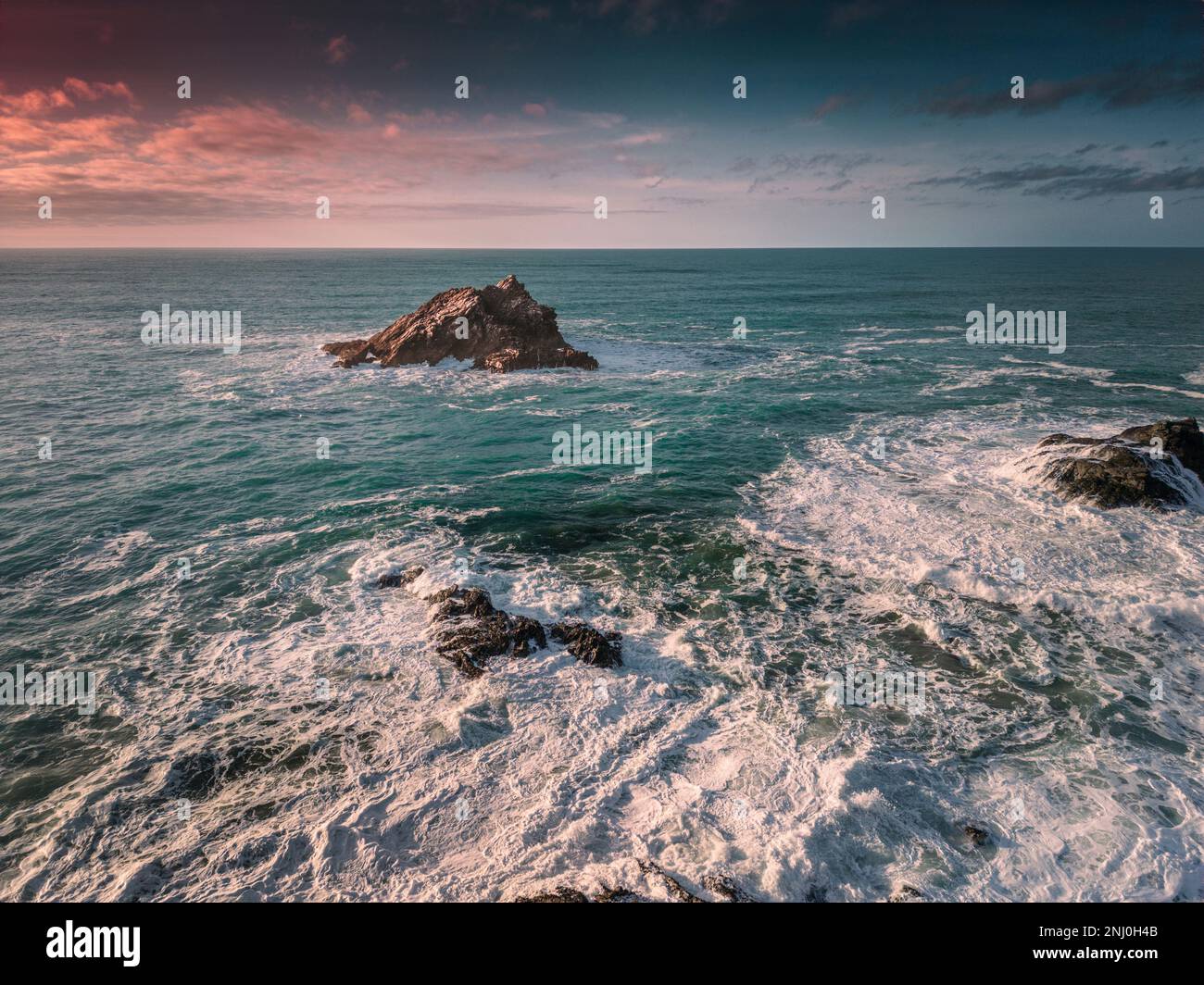 A spectacular aerial view of the small rocky uninhabited island called ...